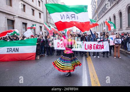 Rome, Italy. 19th Nov, 2022. An Iranian girl waves an Iranian flag ...