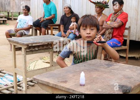 Indigenous people, boy of the indigenous people Huni Kuin working in ...