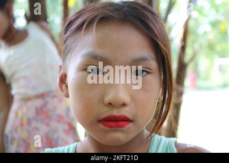 Indigenous people, little girl of the indigenous people Huni Kuin wears ...