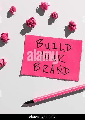 Sign displaying Your Brand. Word Written on A name of any kind that is ...