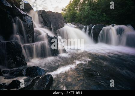 A natural view of Petawawa River waterfall into Cedar Lake in Algonquin ...