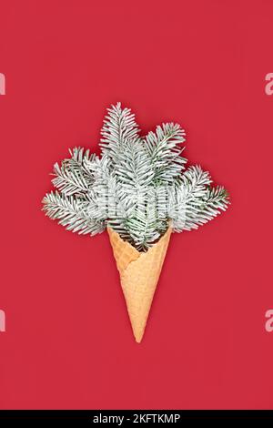 Christmas fun decorative surreal ice cream cone concept with snow ...