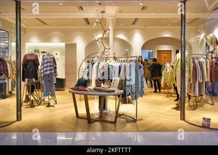 HONG KONG, CHINA - CIRCA DECEMBER, 2019: mannequins dressed in female ...