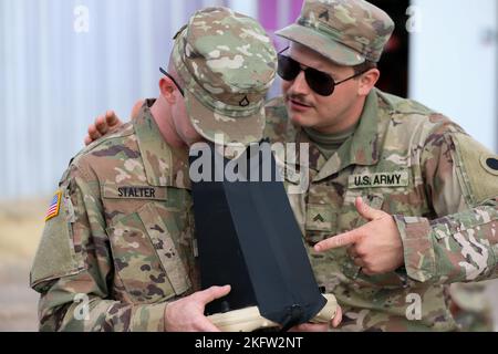 U.S. Army Cpl. Justin Richter, assigned to Headquarters and ...