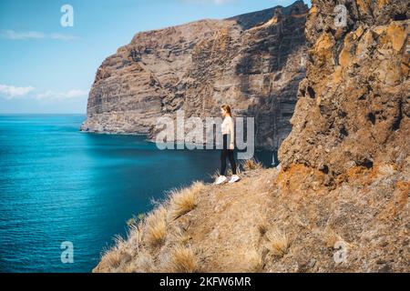 Amazing aerial view of the Los Gigantes cliffs on Tenerife island on a ...