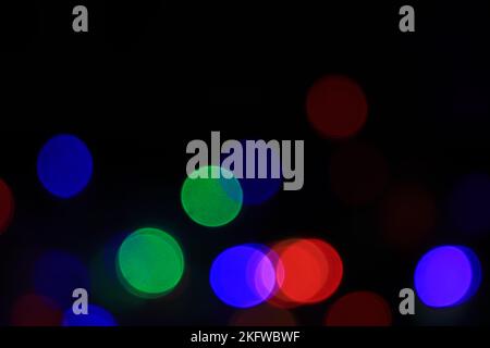 abstract blurred of blue and silver glittering shine bulbs lights ...