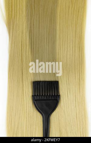 Hair coloring set with brush and strand of color hair Stock Photo - Alamy