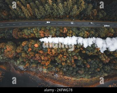 Steam Train Seen From a Bird's Eye View in the Autumn Stock Photo - Alamy