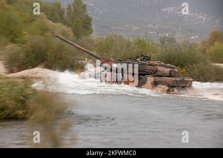 A Leo2 A6 HEL assigned to the Hellenic XXV Armored Brigade, prepares to ...