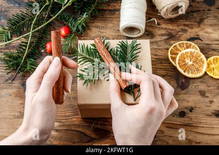 Wrapping Christmas gifts. Hobby time Stock Photo - Alamy