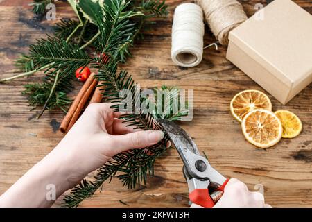 Wrapping Christmas gifts. Hobby time Stock Photo - Alamy