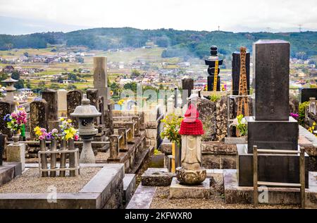 Traditional japanese cemetery tombstones and statues nobody Stock Photo ...