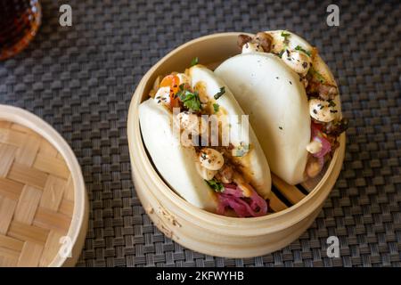 Delicious Pork Belly Served on a Bed of Vegetables With a Refreshing ...