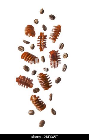 Coffee pasta and coffee beans in motion on a white background Stock ...
