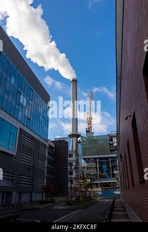 CO2 emissions. Industrial factory polluting air with smoke outdoors ...