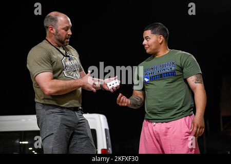 Jason Michaels, a magician with Operation Magic All Stars, performs a ...
