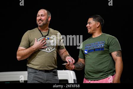 Jason Michaels, a magician with Operation Magic All Stars, performs a ...