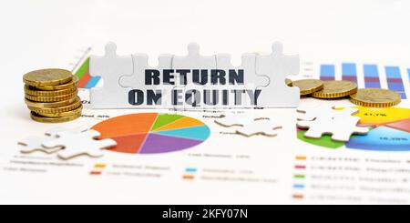 Business and Economics. There are coins and puzzles on financial charts ...