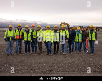 Personnel with Kiewit Infrastructure pose for a photo on what is yet to ...