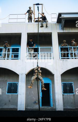 A U.S. Marine with 3d Littoral Combat Team, 3d Marine Littoral Regiment ...
