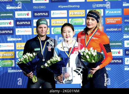 ceremony 500m women L-R Min-Sum Kim (KOR), Femke Kok (NED), and Kimi ...