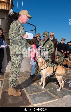 A promotion and commissioning ceremony for the Facility Dog Program at ...