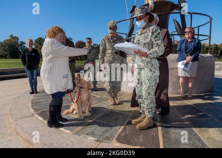 A promotion and commissioning ceremony for the Facility Dog Program at ...
