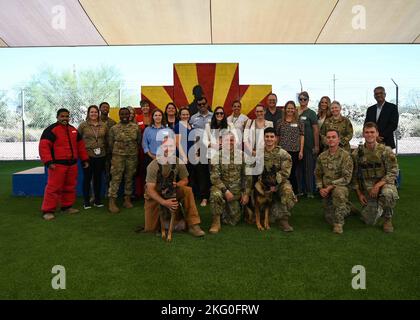 Civilian medical providers pose for a group photo with members of the ...
