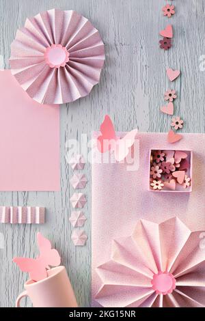 Paper fans, butterflies, flowers and festive lights in garland. Flat ...