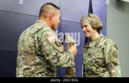 Chaplain (Lt. Col.) Martha Kester smiles outside her home in Des Moines ...