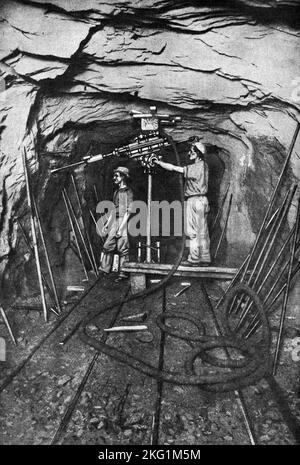 Mining With a Compressed Air Drill - Vintage Cigarette Card Stock Photo ...