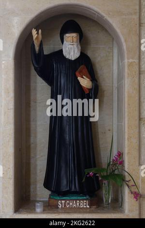Saint Charbel statue in a maronite church in Jieh, Lebanon Stock Photo ...