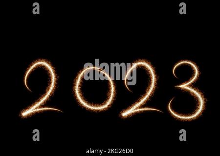 2023 written with Sparkle firework on black background, happy new year ...
