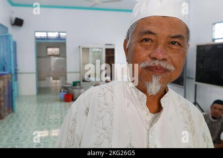 Portrait of smiling muslim man. Chau Doc. Vietnam Stock Photo - Alamy