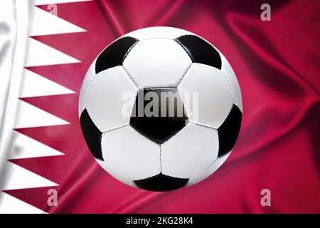 Football fans play in front of a FIFA World Cup 2026 themed mural in ...