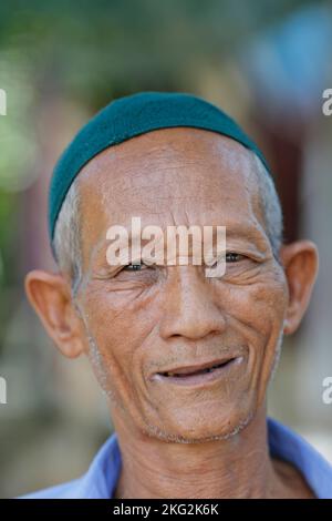 Portrait of smiling muslim man. Chau Doc. Vietnam Stock Photo - Alamy