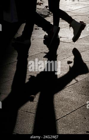 Shadow of Two Men Stock Photo - Alamy