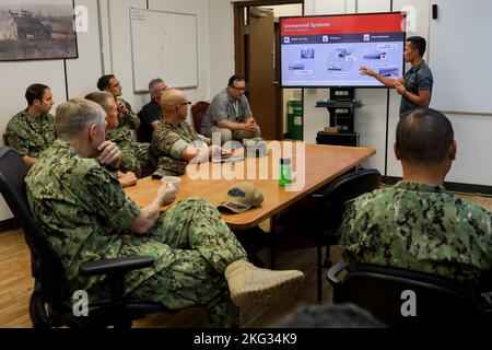 NG Chee Wee, ST Engineering, delivers a demonstration brief to Rear Adm ...