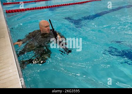 Sgt. 1st Class Cory Fowler from Madigan Army Medical Center, performs ...