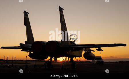 The sun rises on an F-15EX Eagle II after a night of ground testing Oct ...