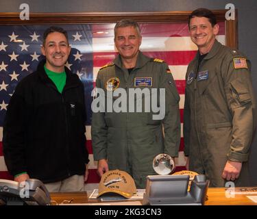 Rear Adm. Greg Huffman, right, commander, Carrier Strike Group (CSG) 12 ...
