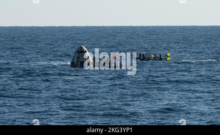 NASA’s SpaceX Crew-4 Splashdown. Support teams work around the SpaceX Crew Dragon Freedom ...