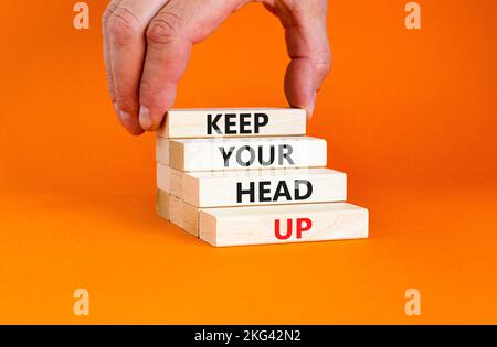 Keep your head up symbol. Concept words Keep your head up on wooden ...