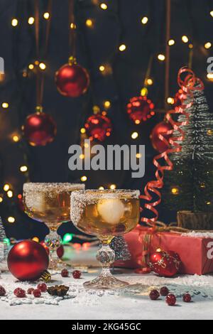 Red Christmas bauble decoration with drops of red paint on white ...