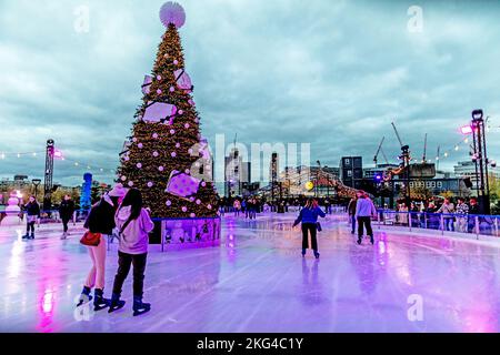 Ice Skating At Battersea Power Station at Night London UK Stock Photo ...