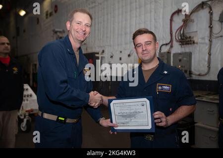 Capt. Matthew Mulcahey, left, the first-in-class aircraft carrier USS ...