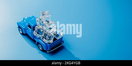 Toy blue car with ice. Minimalism Ice Machine Stock Photo - Alamy