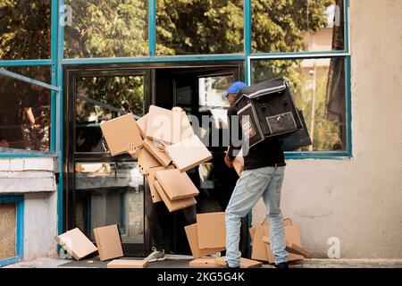 Reckless delivery worker dropping pizza boxes, scared courier running ...