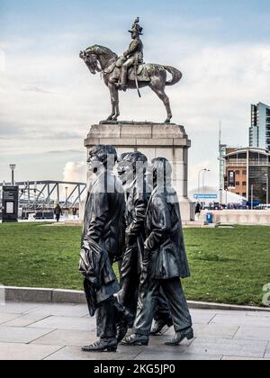 Street scene in Liverpool with the bronze statues of the famous Beatles ...