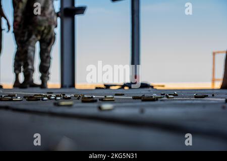 Expended shell casings from an M4 carbine lay on the Combat Arms ...